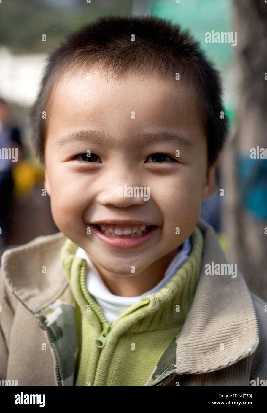 Portrait of a boy smiling Stock Photo - Alamy