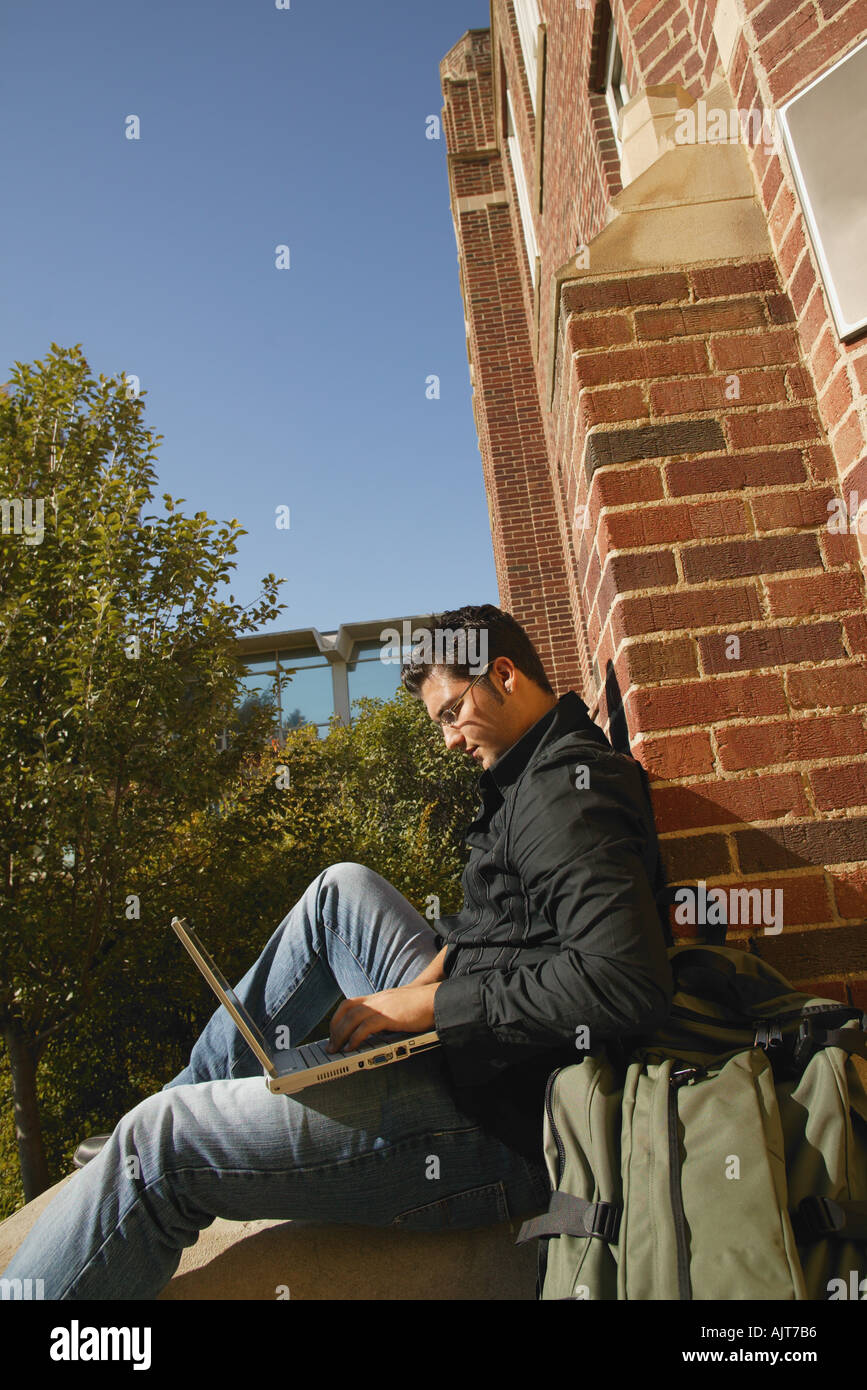 Man lap top and teenagers hi-res stock photography and images - Alamy
