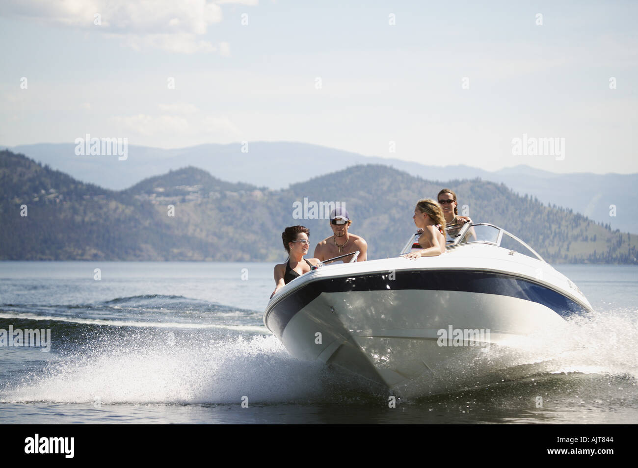 Speed boat moving on water Stock Photo - Alamy