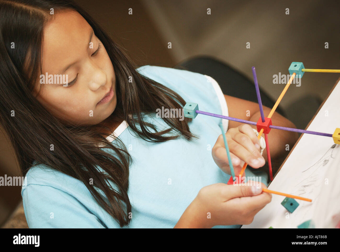Child building a structure Stock Photo - Alamy