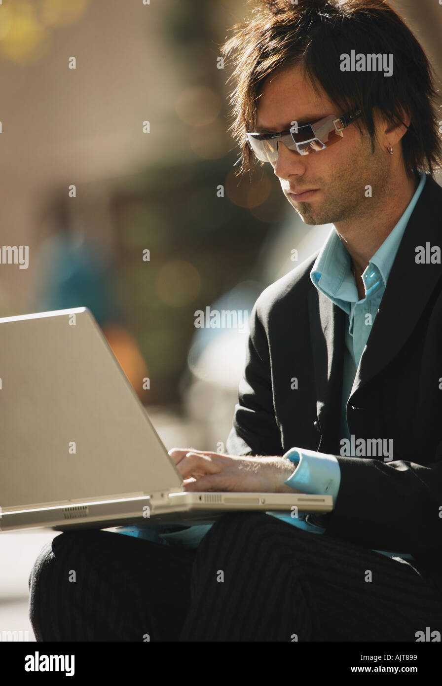 Man working on computer Stock Photo - Alamy