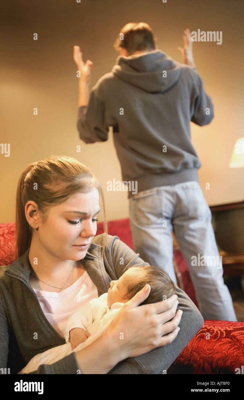 Concerned couple with new baby hi-res stock photography and images - Alamy