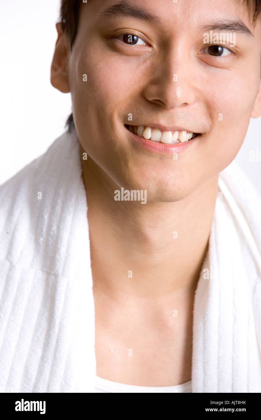 Portrait of a young man smiling Stock Photo - Alamy