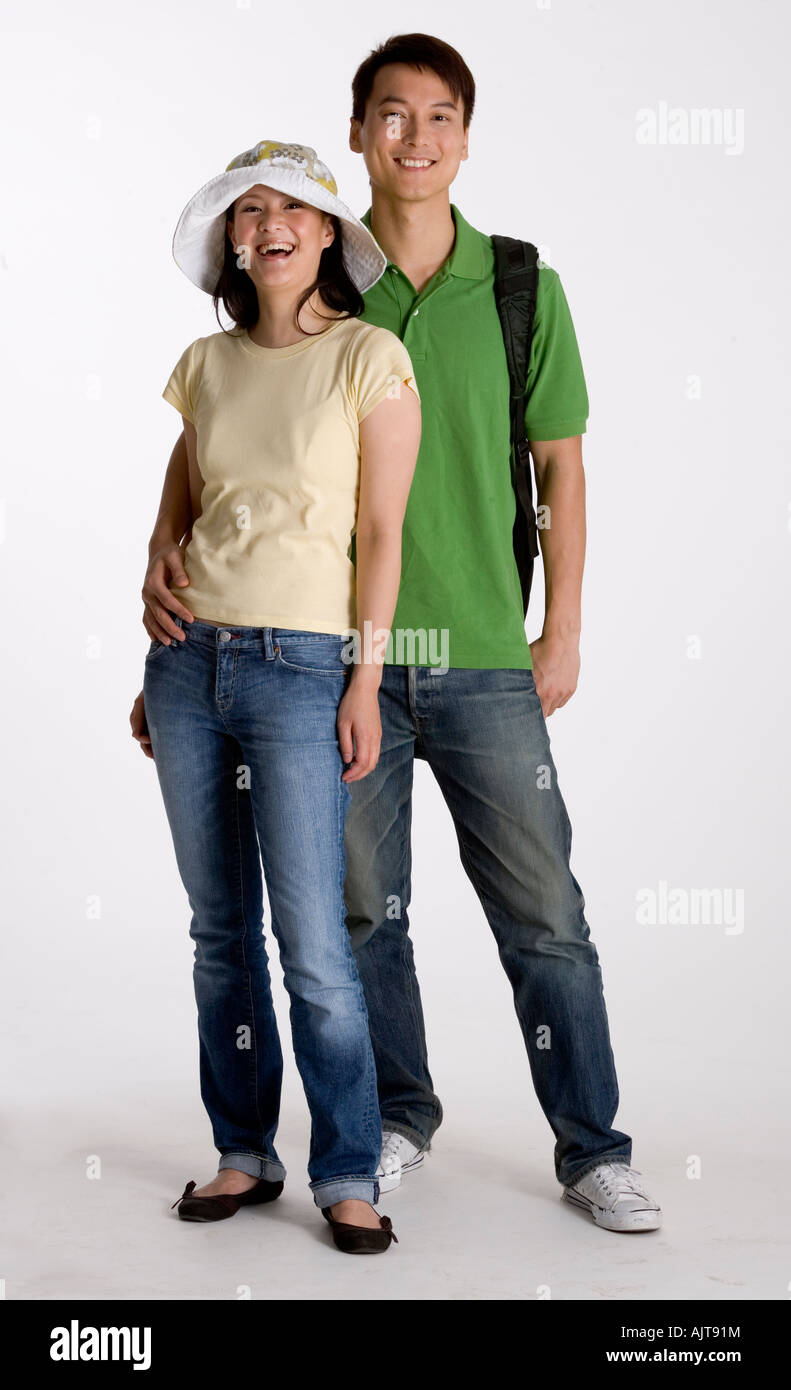 Portrait of a young couple smiling Stock Photo - Alamy