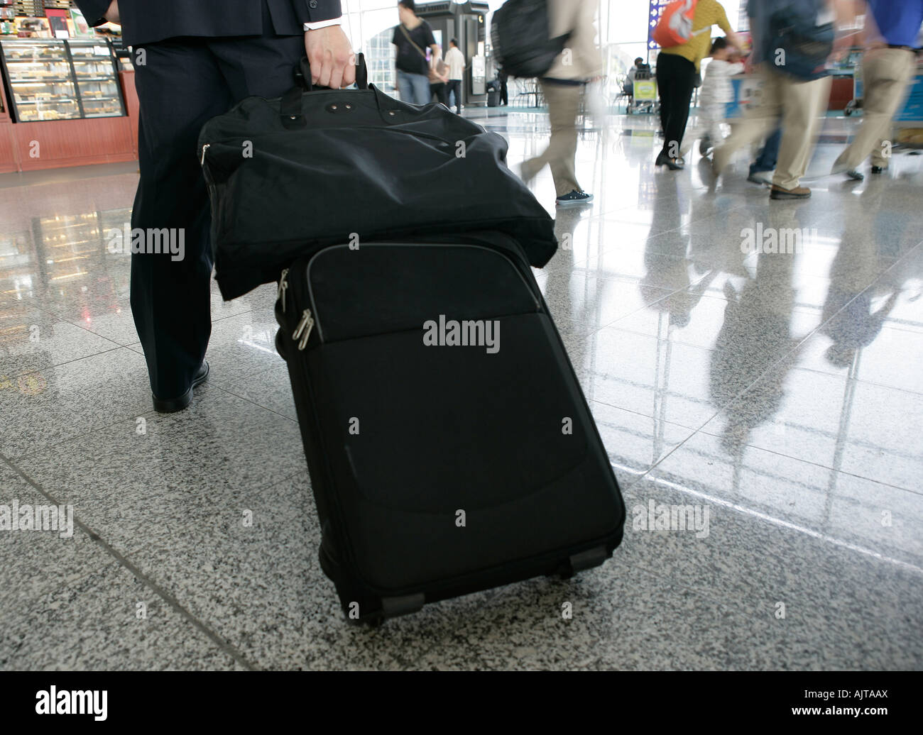 Passenger pulling luggage close up hi-res stock photography and images ...