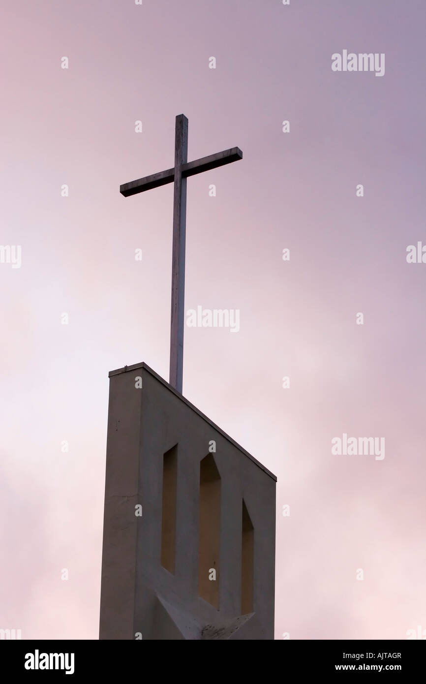 Church cross over purple sky Stock Photo - Alamy