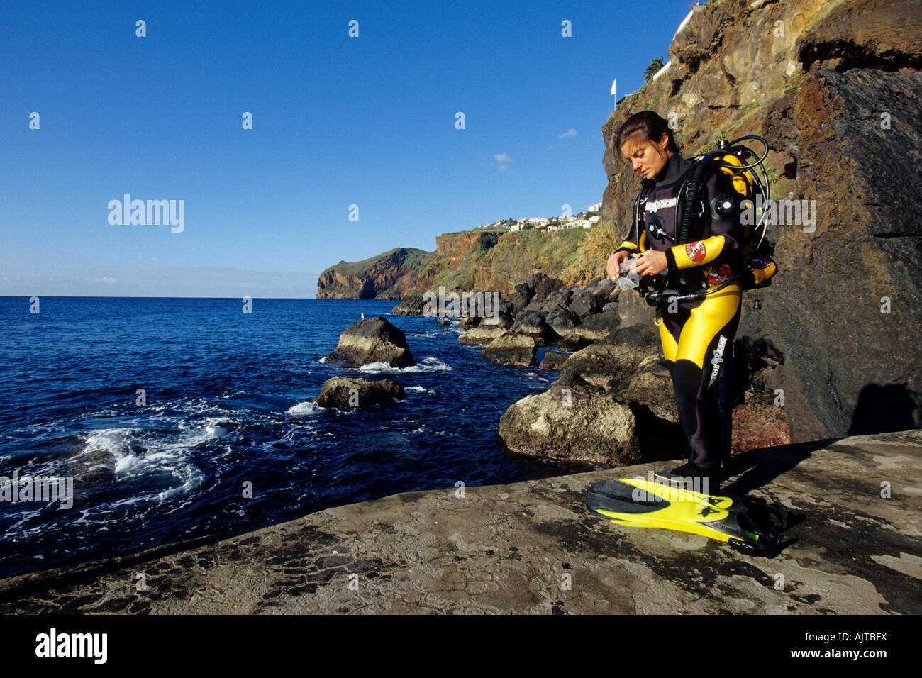scuba diver getting ready for diving Madeira Island Atlantic Portugal ...
