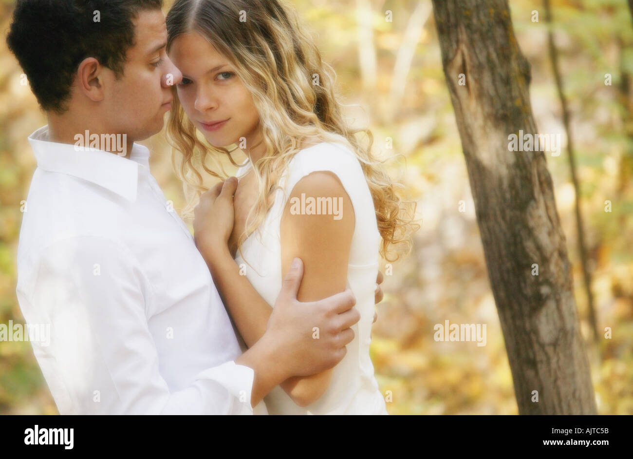 Couple holding each other Stock Photo - Alamy