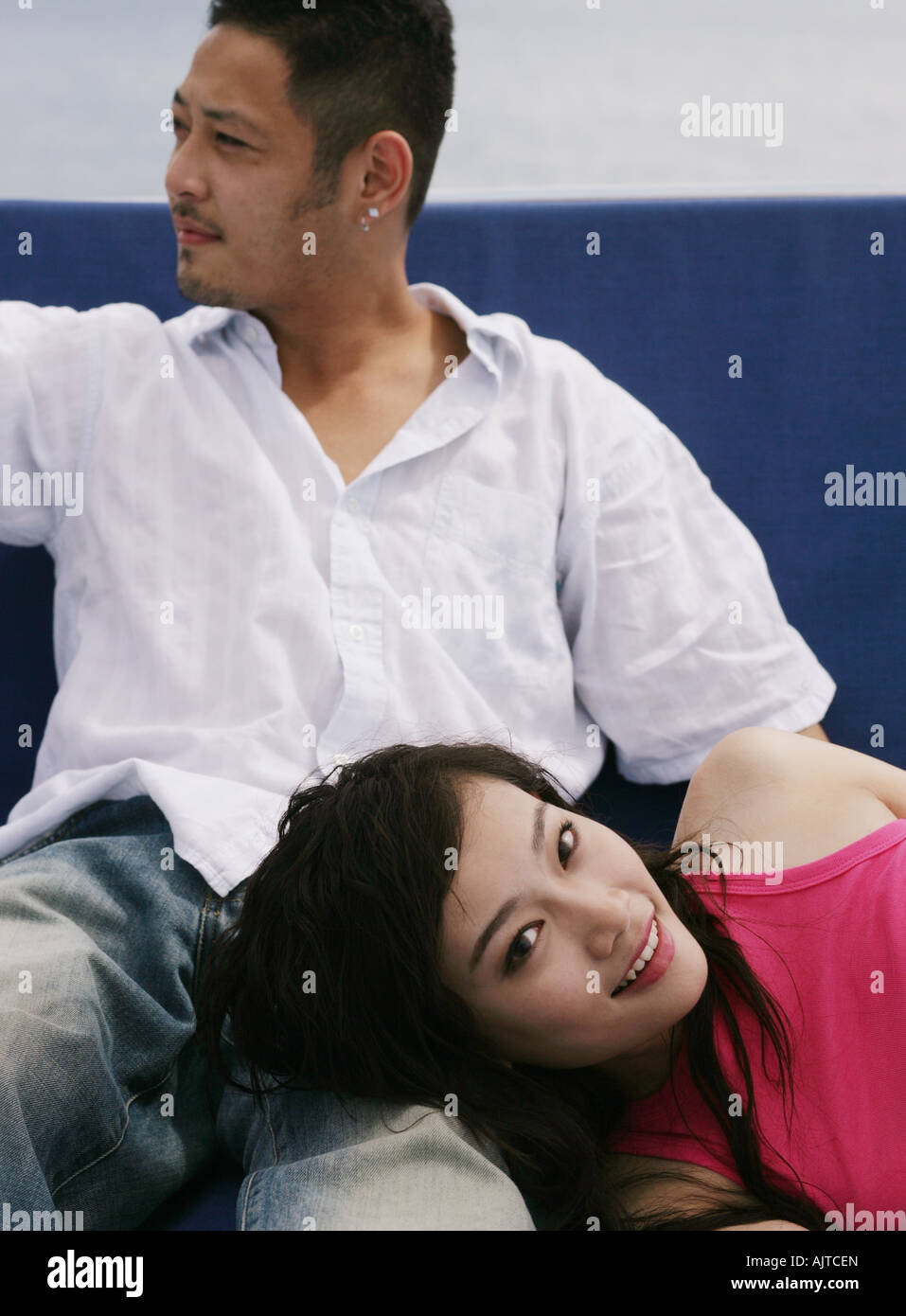 Woman sitting on mans lap hi-res stock photography and images - Alamy