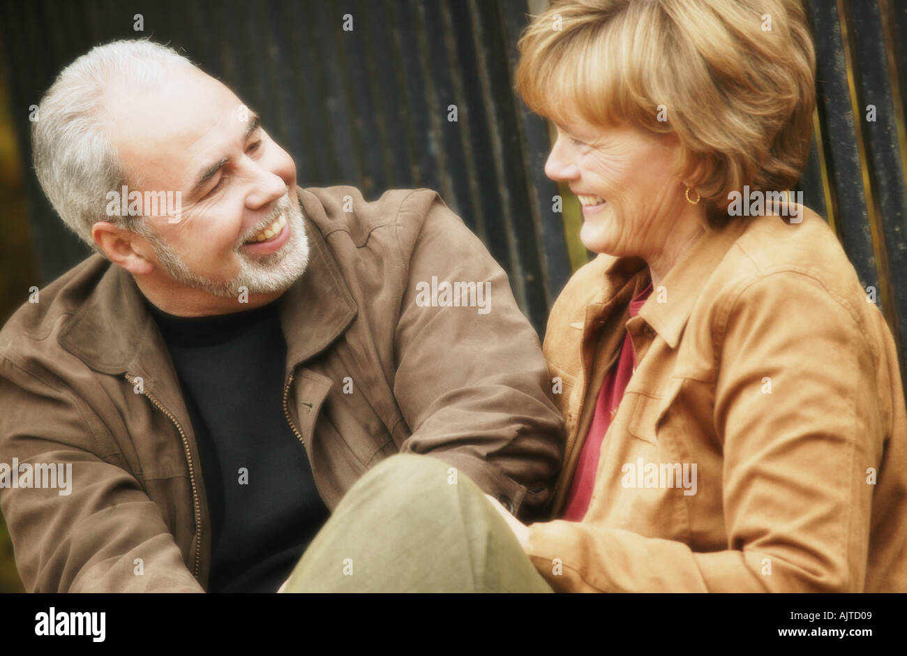 Man woman talking fence hi-res stock photography and images - Alamy