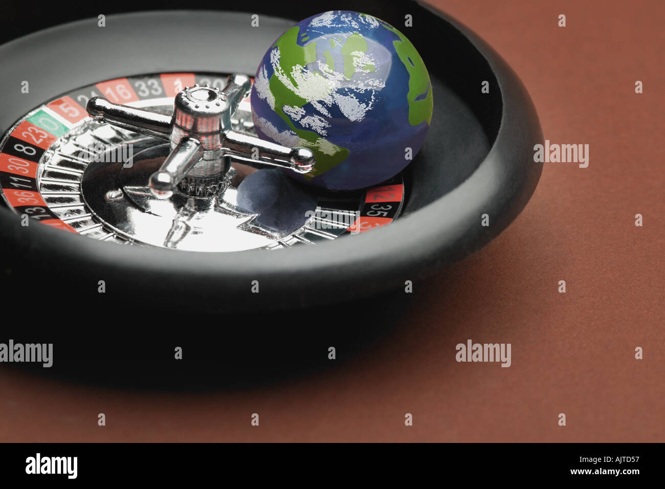 Globe in a roulette wheel Stock Photo - Alamy