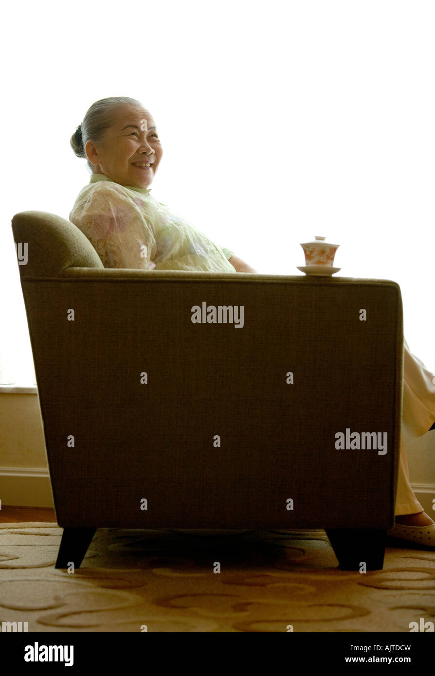 Profile sitting alone adult asian hi-res stock photography and images ...