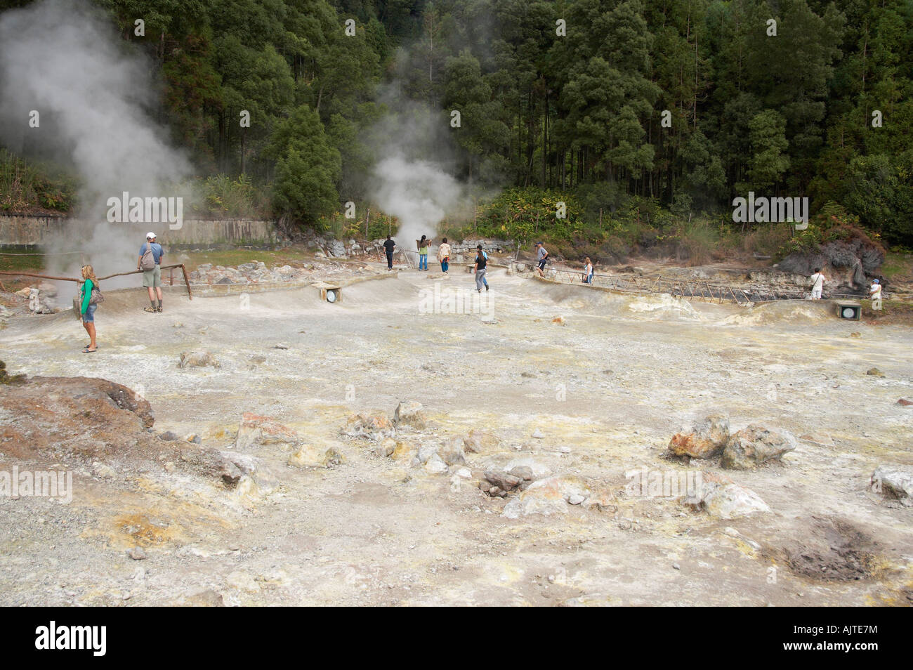 Tourists near thermal hot springs near Furnas lake, Soa Miguel island ...
