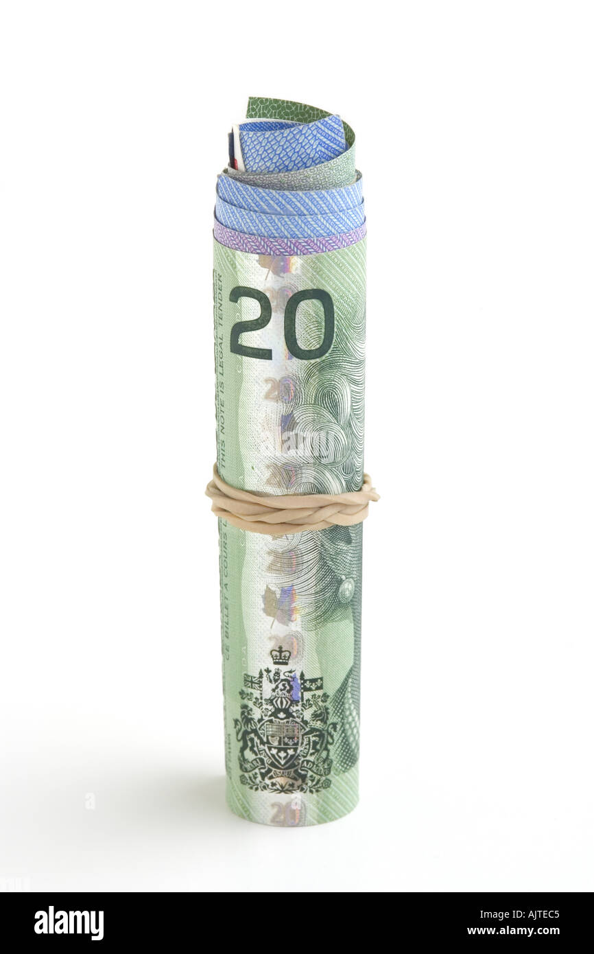 Roll of 20 dollar bills Stock Photo - Alamy