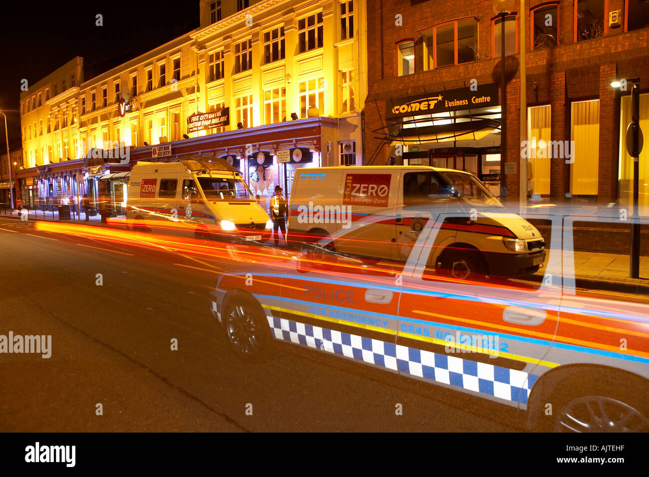 blured police vehicle created by using long exposure in city centre ...