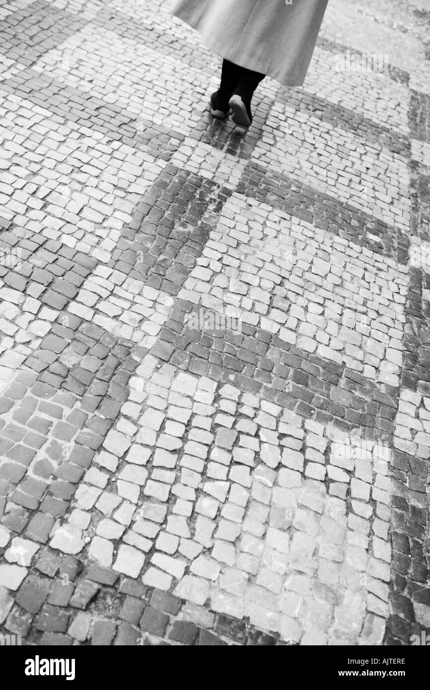 Woman walking about in the city Black and White Stock Photos & Images ...