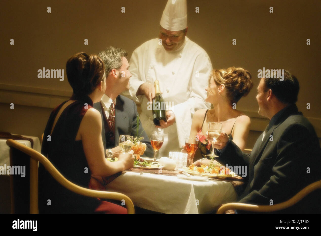 Group people in 30s at dinner table hi-res stock photography and images ...