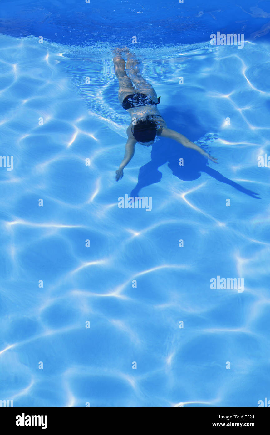 Woman in swimming pool Stock Photo - Alamy