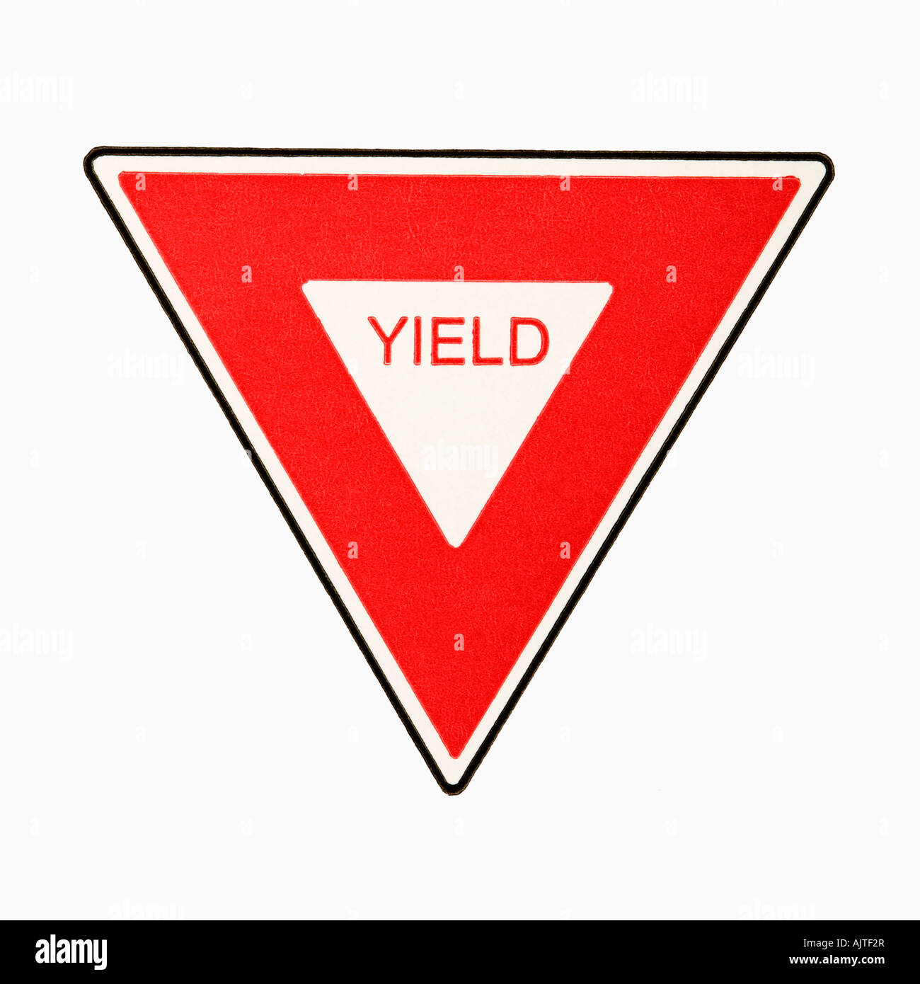 Yield road sign against white background Stock Photo - Alamy