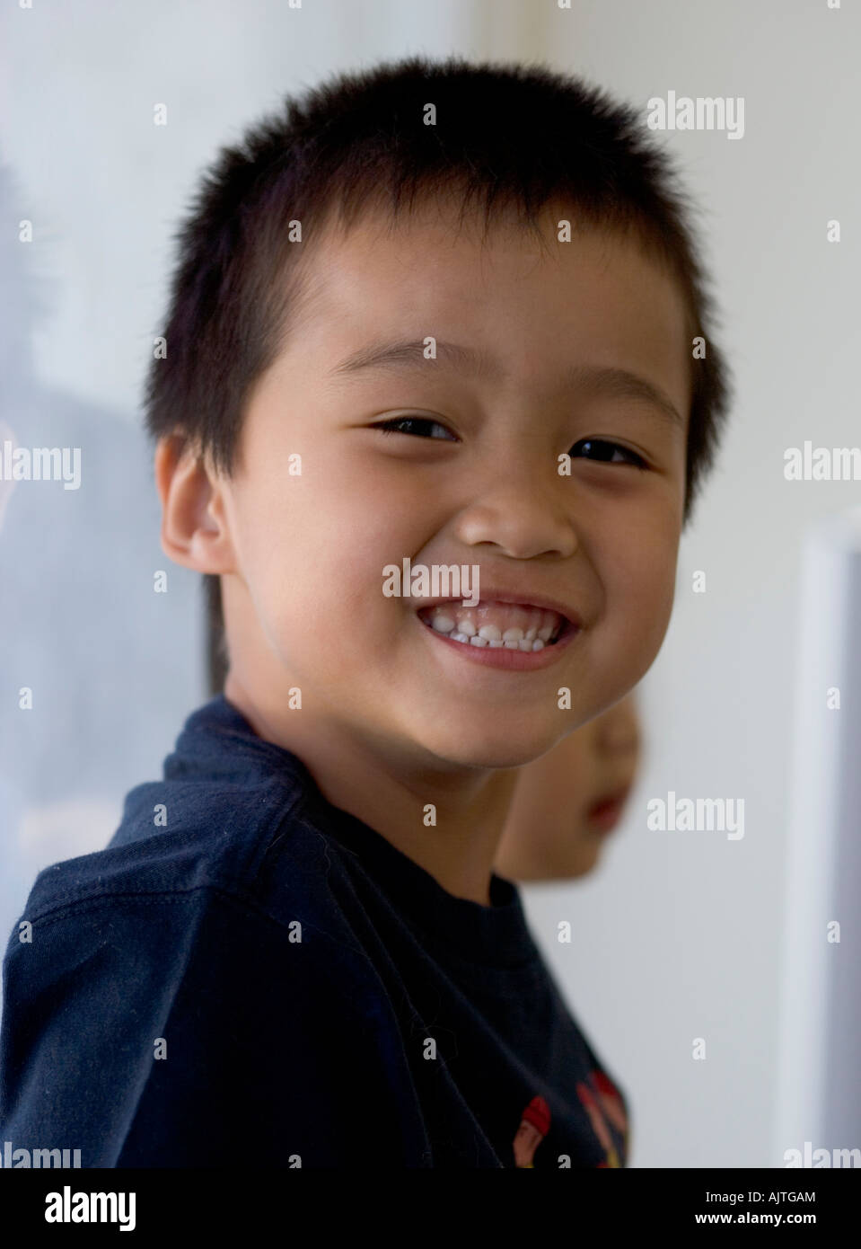 Portrait of a boy smiling Stock Photo - Alamy