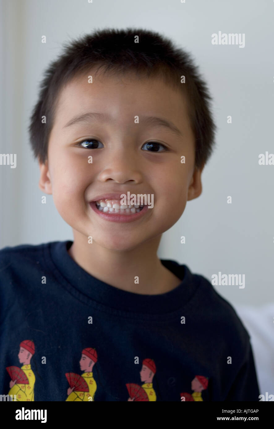 Portrait of a boy smiling Stock Photo - Alamy