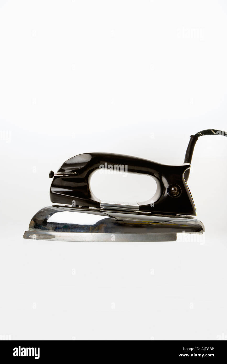 Vintage iron on white background Stock Photo - Alamy