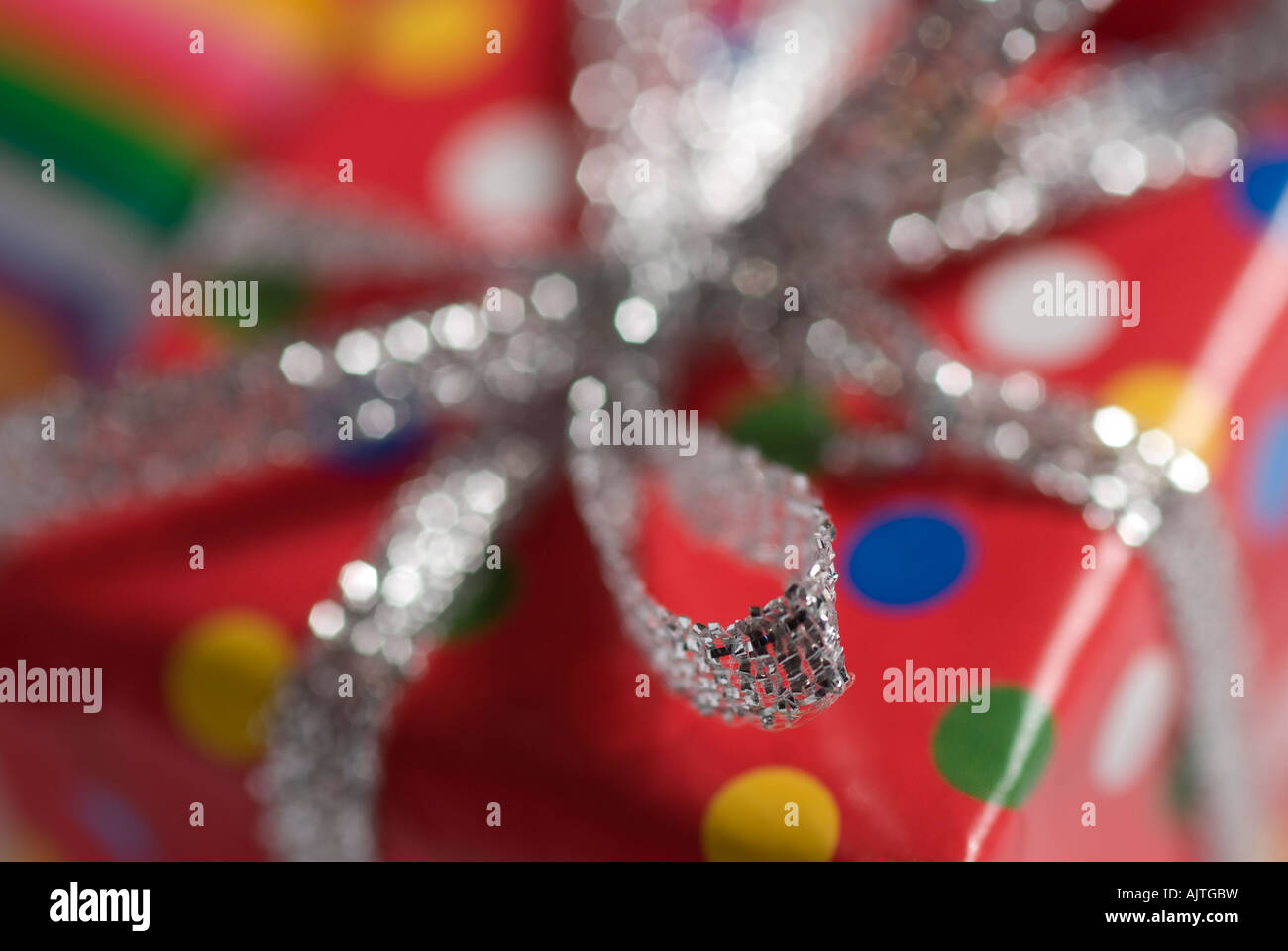 colourful wrapped gift box Stock Photo - Alamy