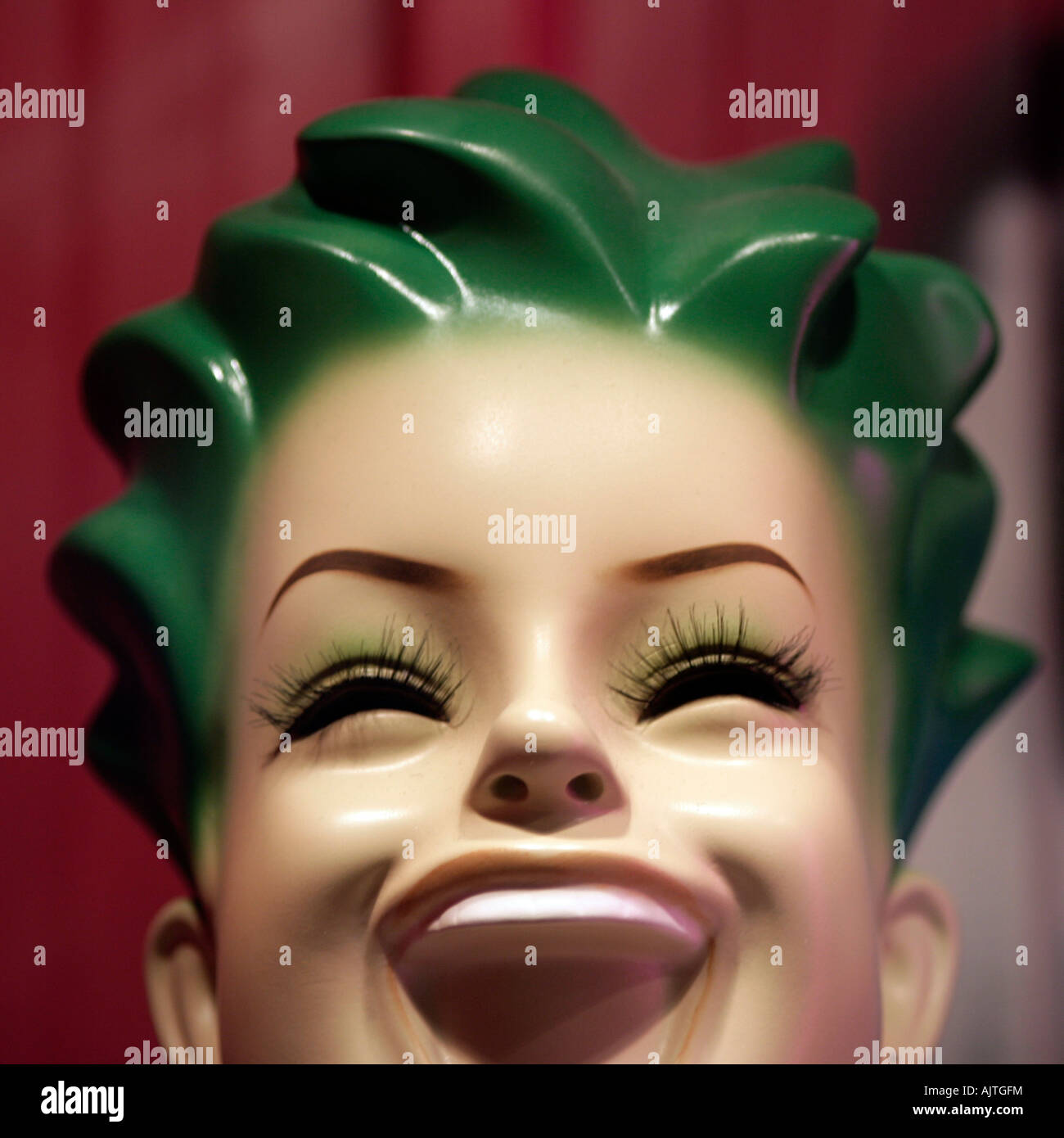 Close-up of a doll laughing Stock Photo - Alamy