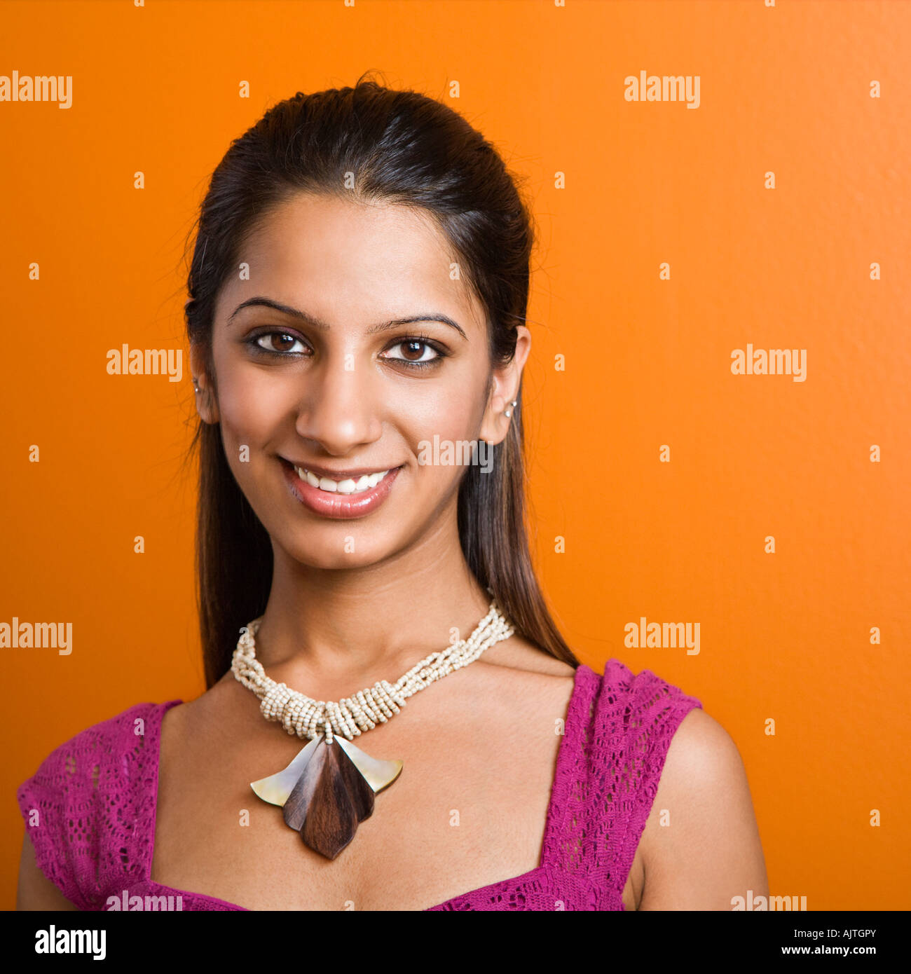 Attractive young adult Indian woman smiling at viewer Stock Photo - Alamy Attractive young adult Indian woman smiling at viewer Stock Photo - Alamy
