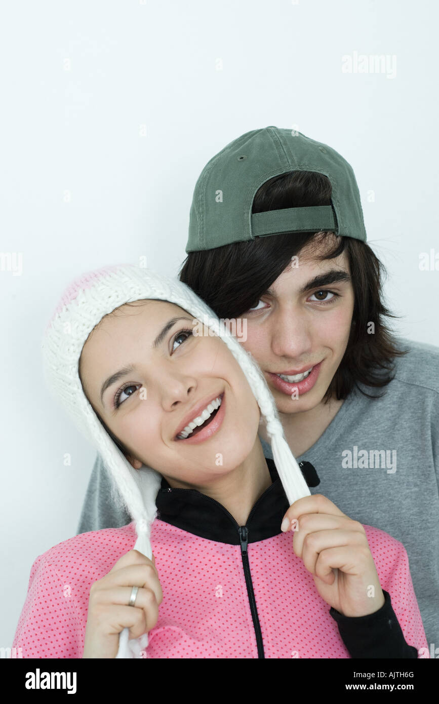 Young couple wearing hats, portrait Stock Photo - Alamy