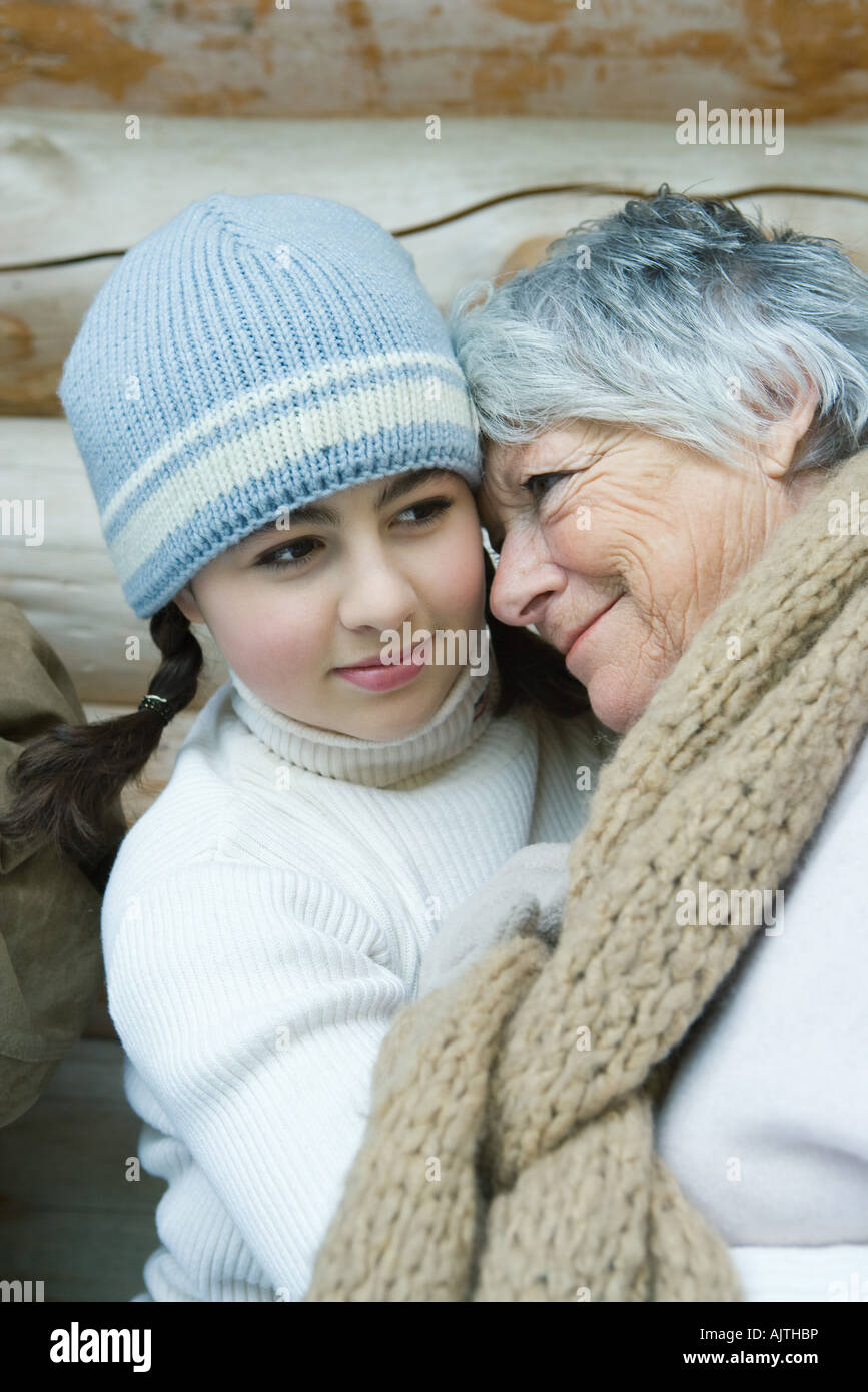 Grandmother and granddaughter, smiling, cheek to cheek, portrait Stock ...