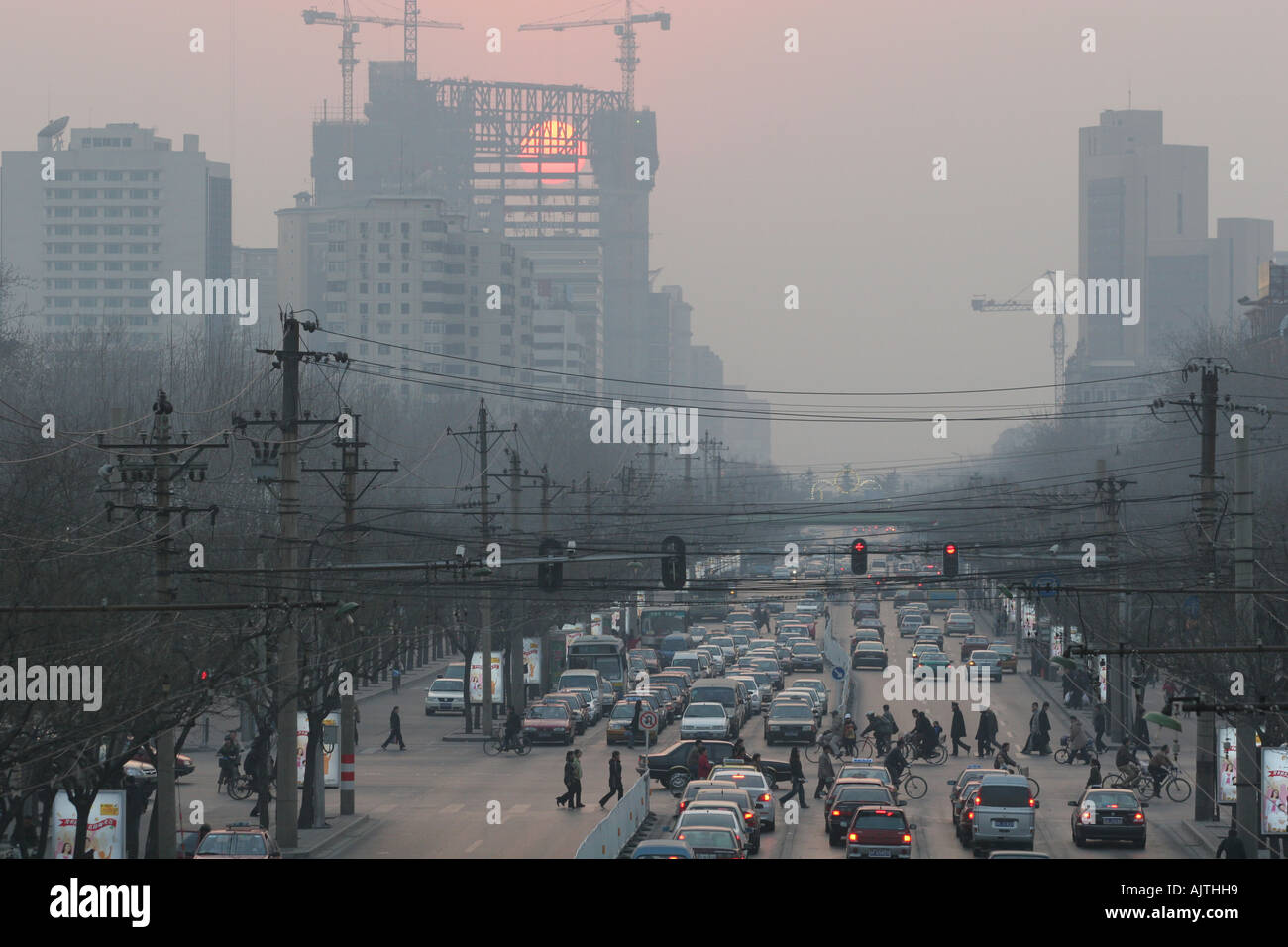 Commuters battle through rush hour traffic on one of Beijing's main ...