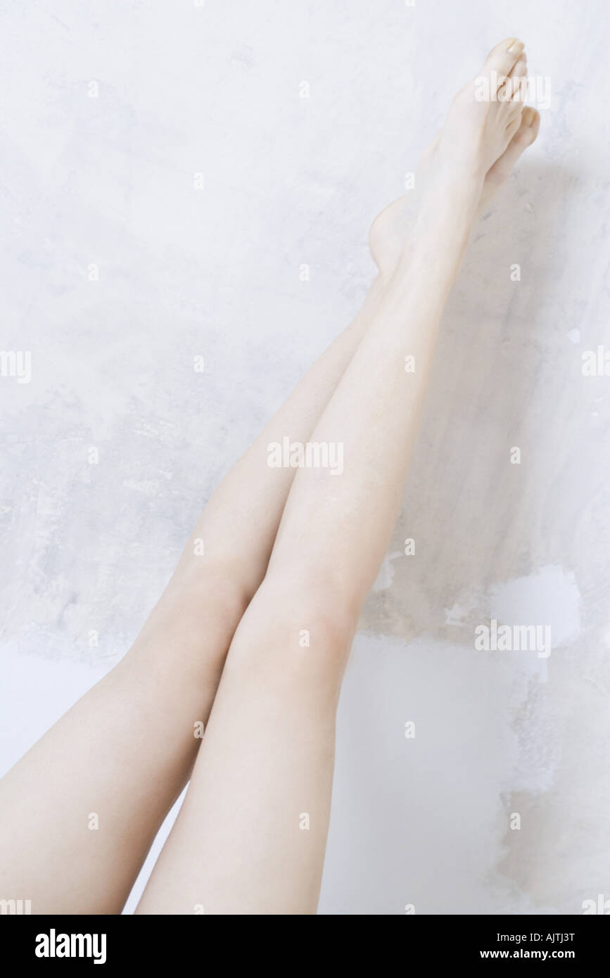 Womans Bare Feet Legs Crossed At Ankle Stock Photo Getty