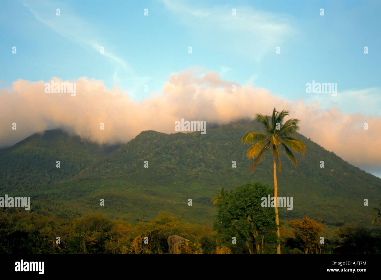 Mount Nevis peak, green volcano crater, brooding summit clouds, clear ...