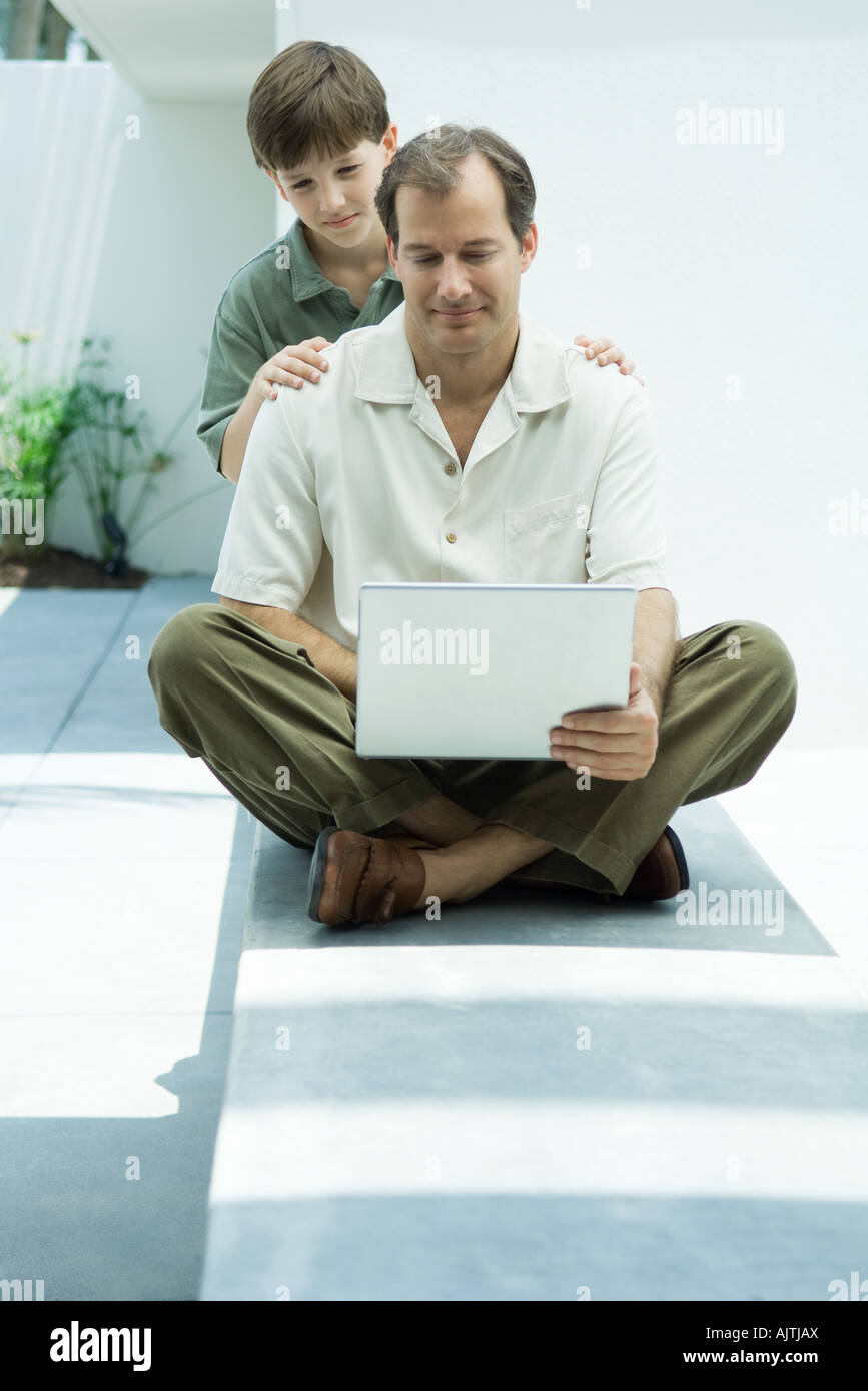 Cross legged man from behind hi-res stock photography and images - Alamy