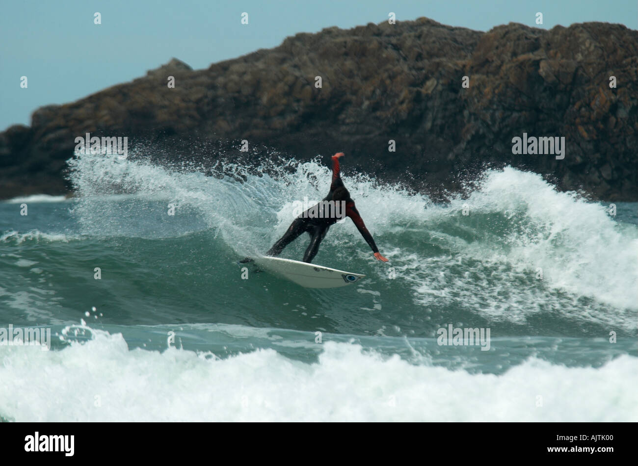 Surfer Riding a Green Wave Stock Photo - Alamy
