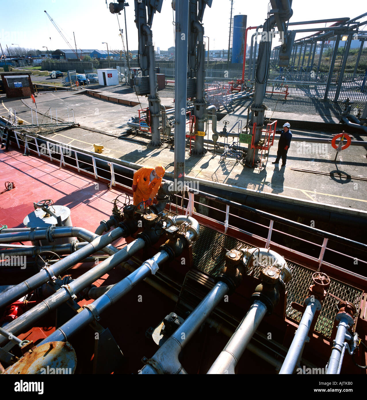 Discharging Oil Products from a Coastal Tanker Stock Photo - Alamy