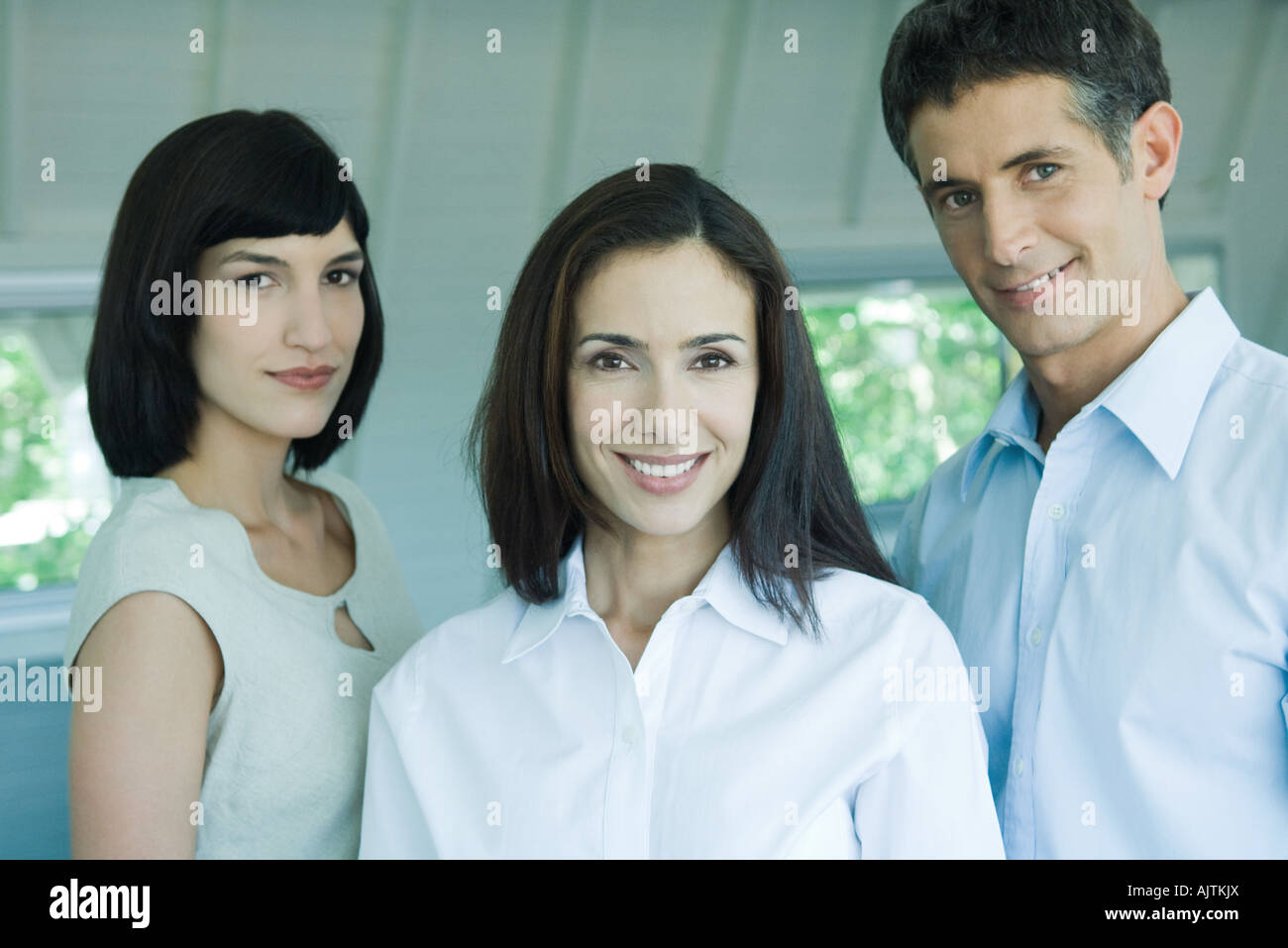 Business team smiling at camera, head and shoulders, portrait Stock ...