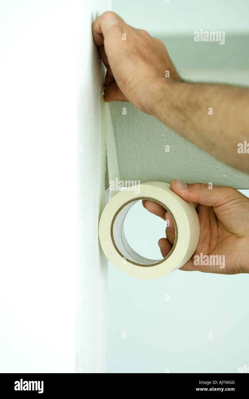 Applying masking tape hi-res stock photography and images - Alamy