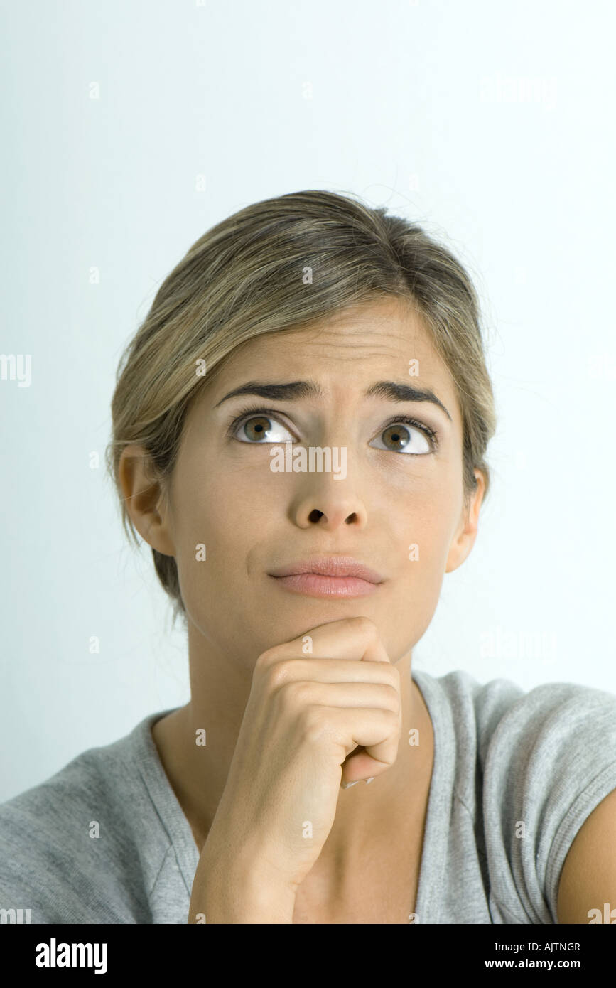 Woman looking up, portrait Stock Photo - Alamy