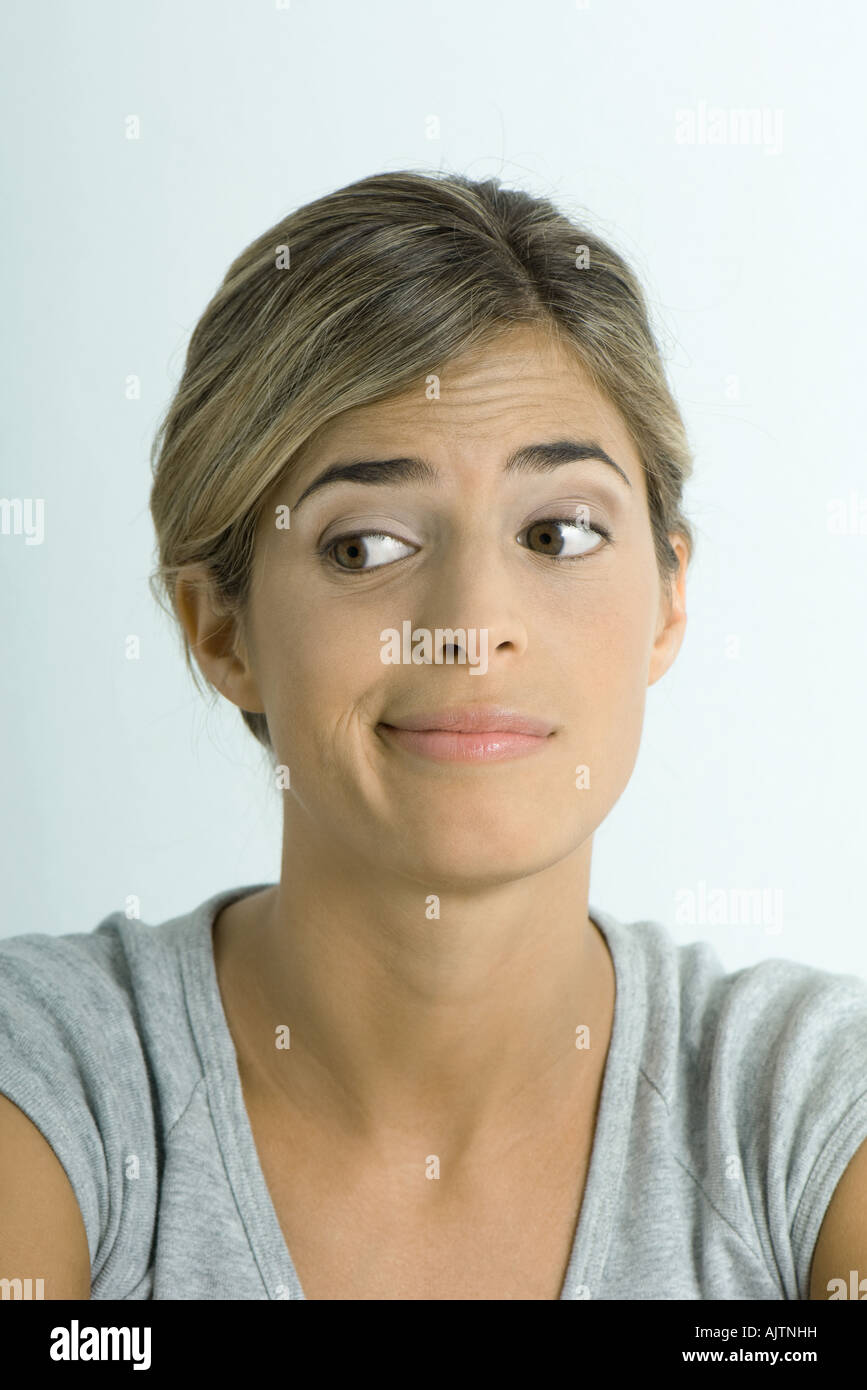 Woman making face, portrait Stock Photo - Alamy
