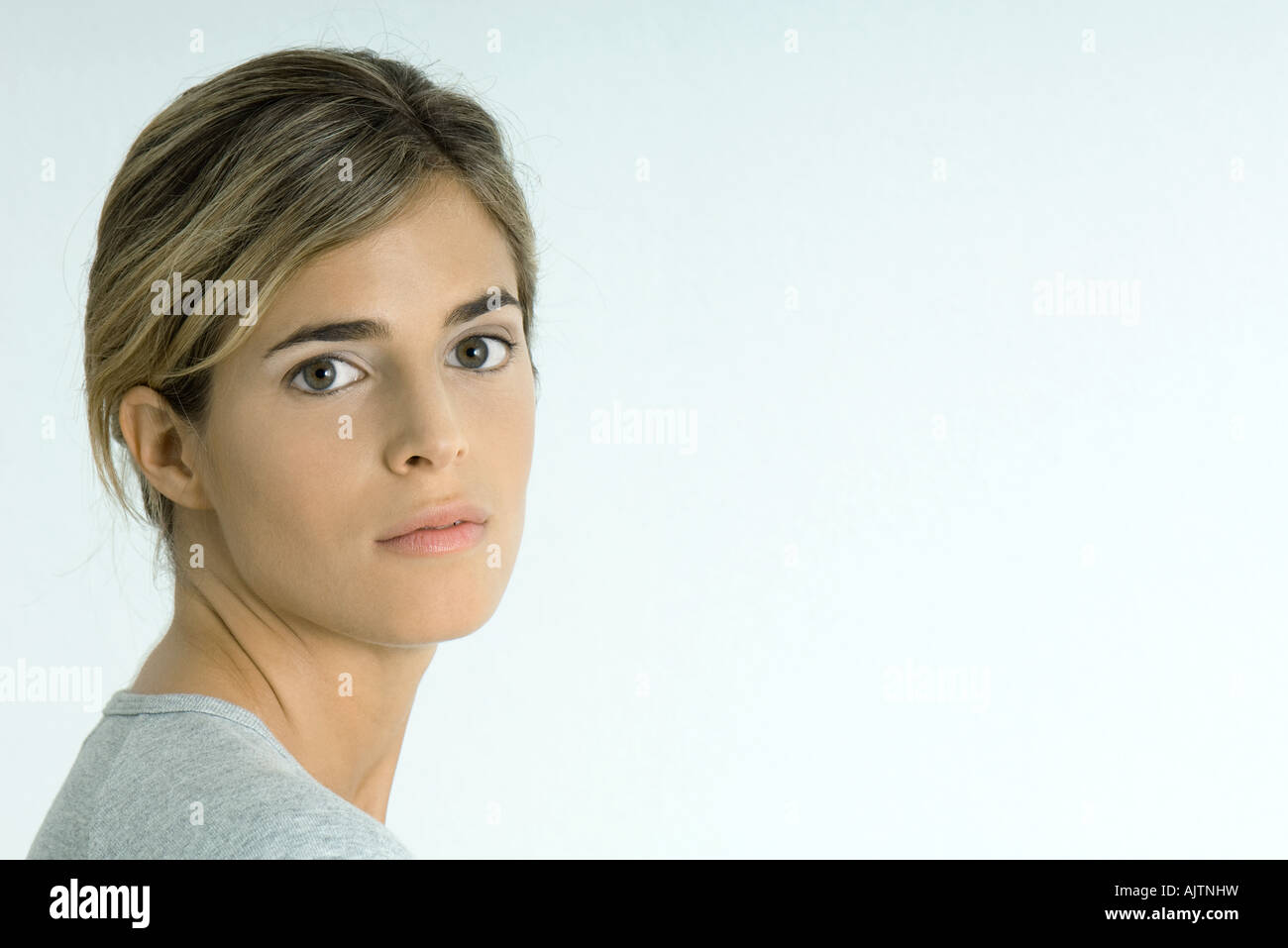 Woman looking at camera, portrait Stock Photo - Alamy