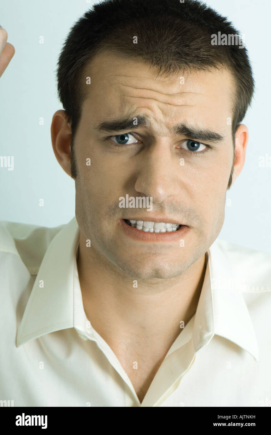 Man furrowing brow portrait hi-res stock photography and images - Alamy