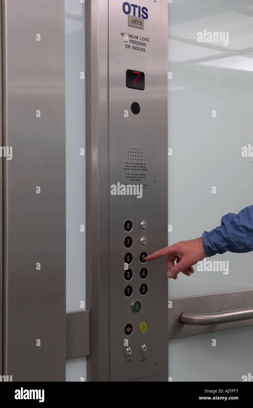 Pushing elevator buttons hi-res stock photography and images - Alamy