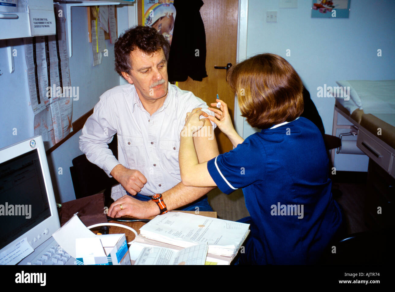 Man Having Injection In Arm Stock Photo - Alamy