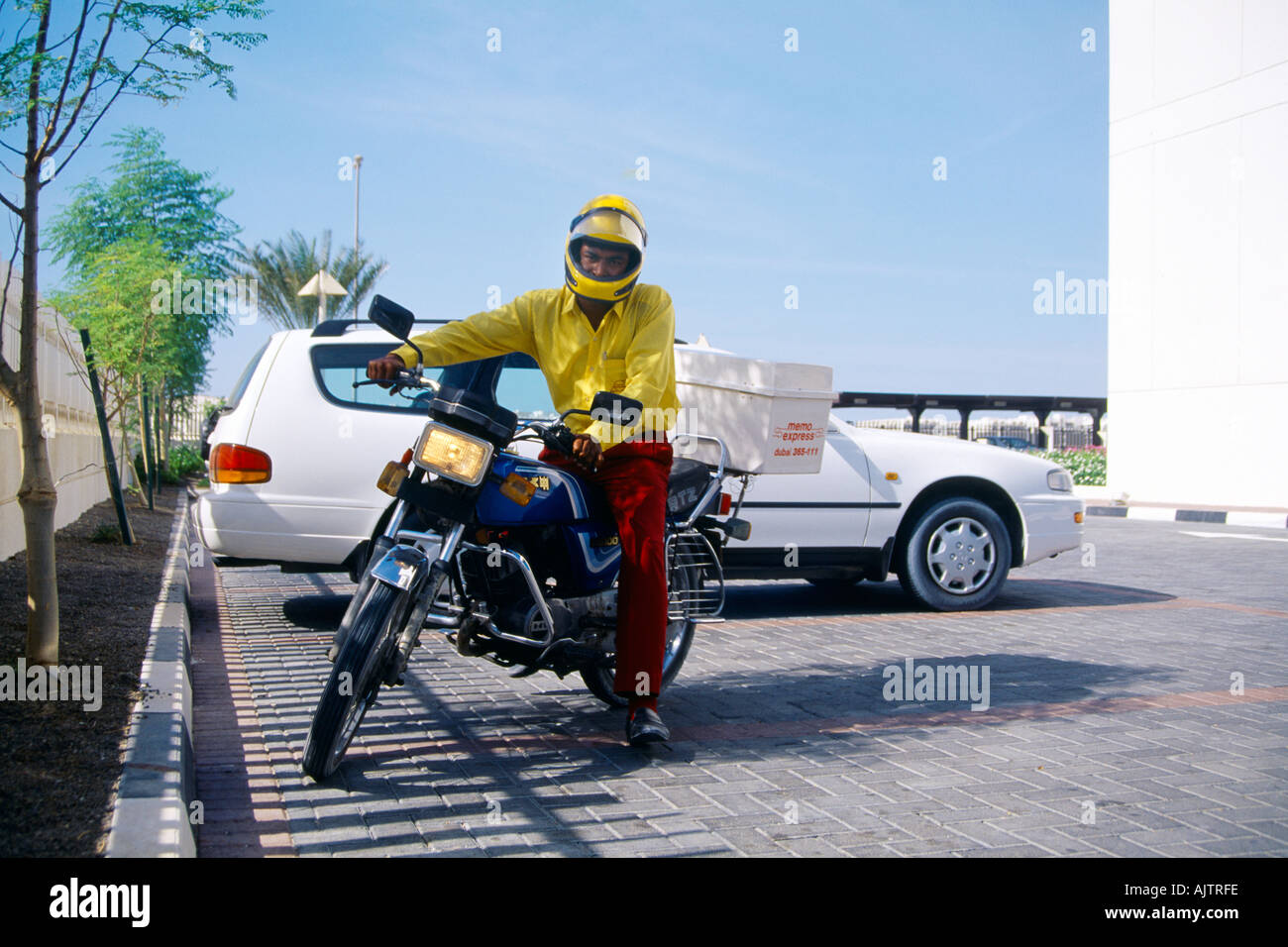 Courier delivery motorbike hi-res stock photography and images - Alamy