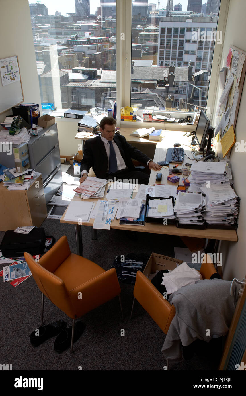 Overflowing desk hi-res stock photography and images - Alamy