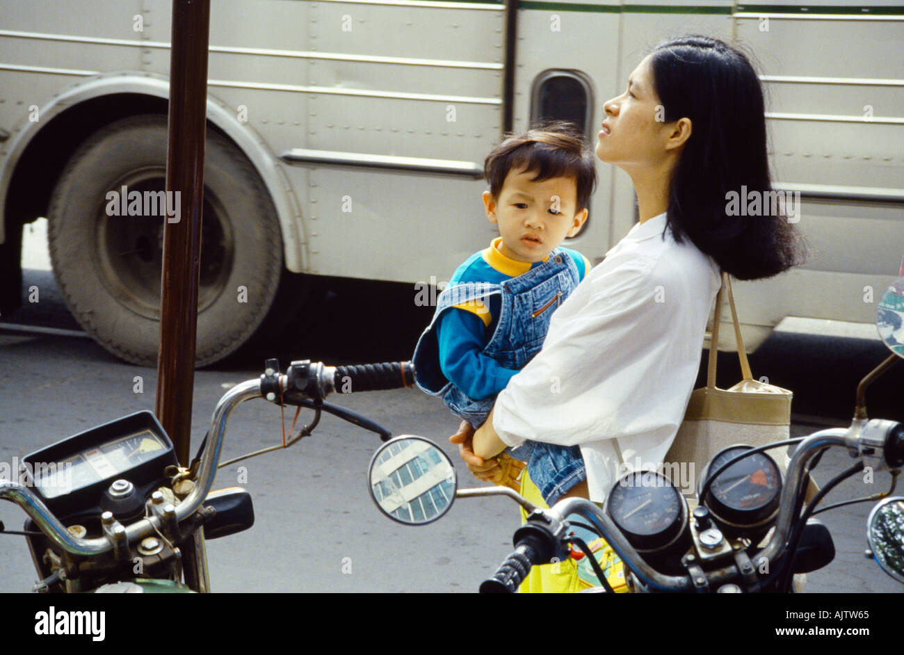 Taipei Taiwan Mother Carrying Child Stock Photo - Alamy