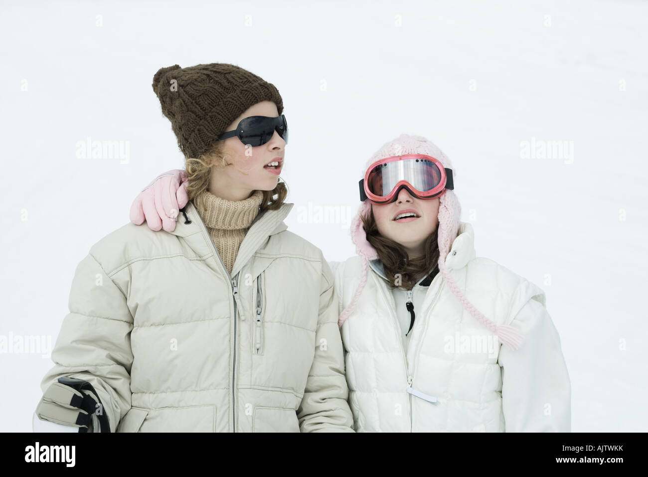 Teen girls dressed in ski gear Stock Photo - Alamy