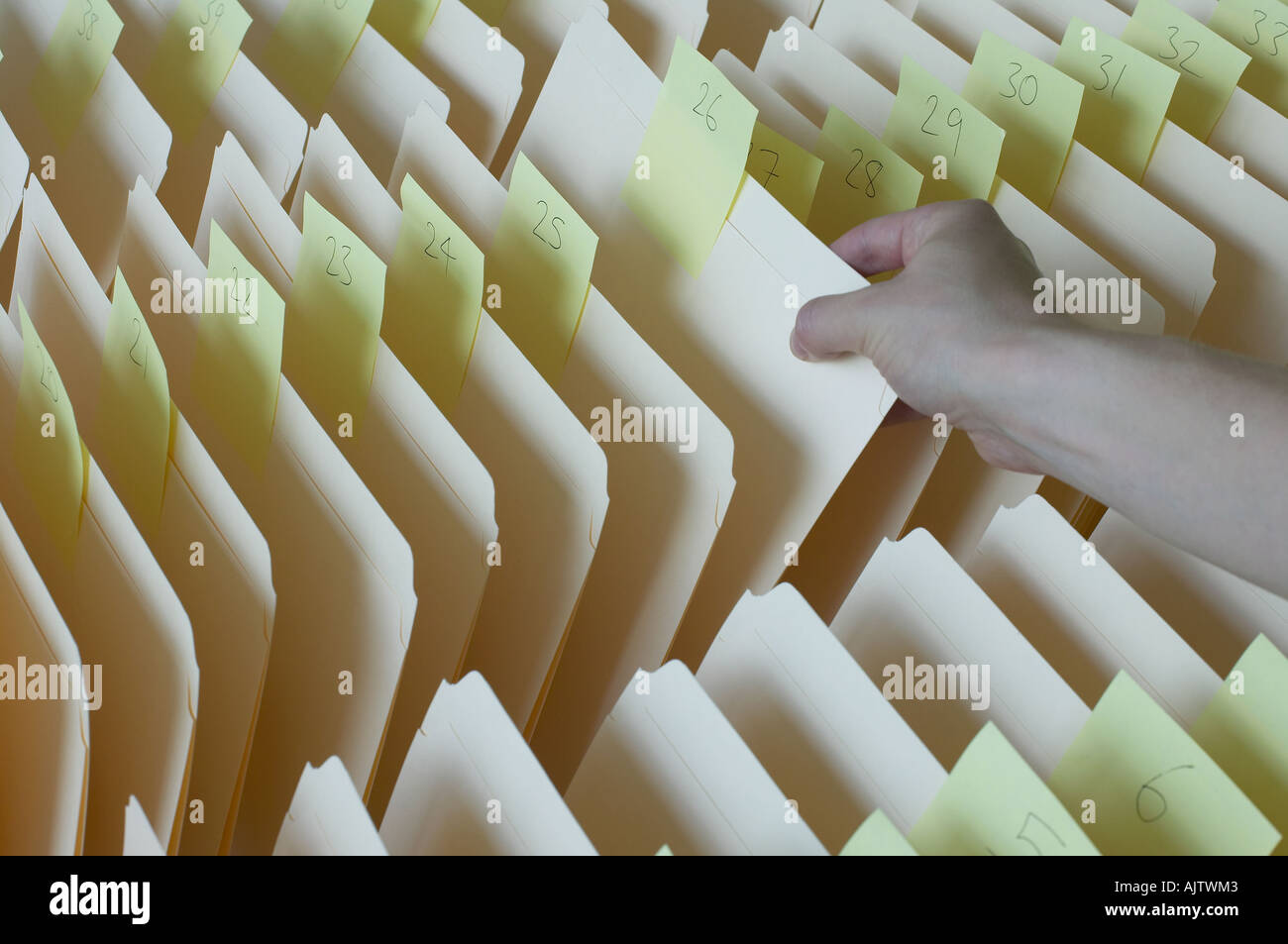 Office life and Interiors Part Two. Files with numbers with hand taking ...